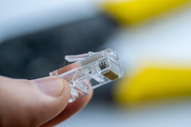 LAN Ethernet Rj45 Connector in Hand. Close Up Stock Photo - Image of ...