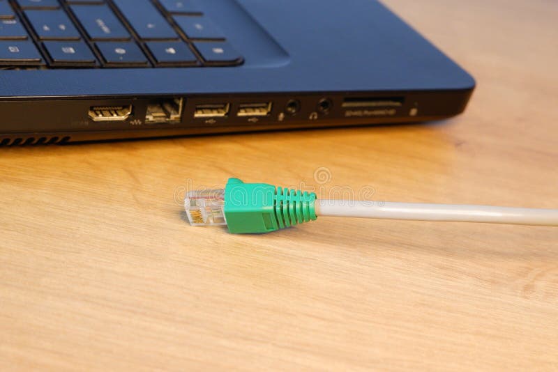 Lan RJ45 Network Connector To a Laptop Stock Image - Image of notebook ...