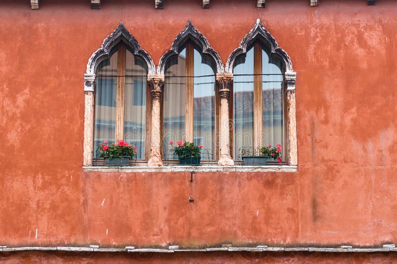 Lancet Windows on Red Terracotta Wall Stock Photo - Image of wall ...