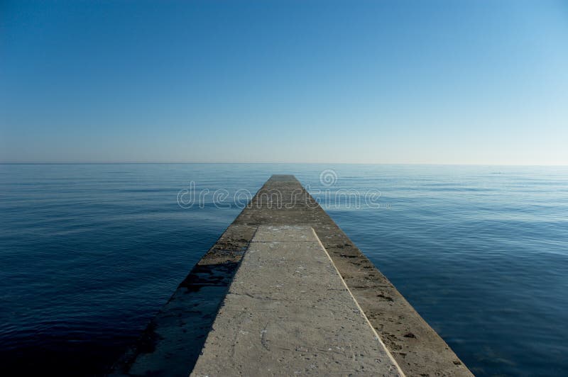 Land Jutting Out into the Sea Stock Photo - Image of breakwater ...