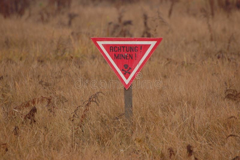 Land mine warning sign stock photo. Image of bomb, explosive - 21939998