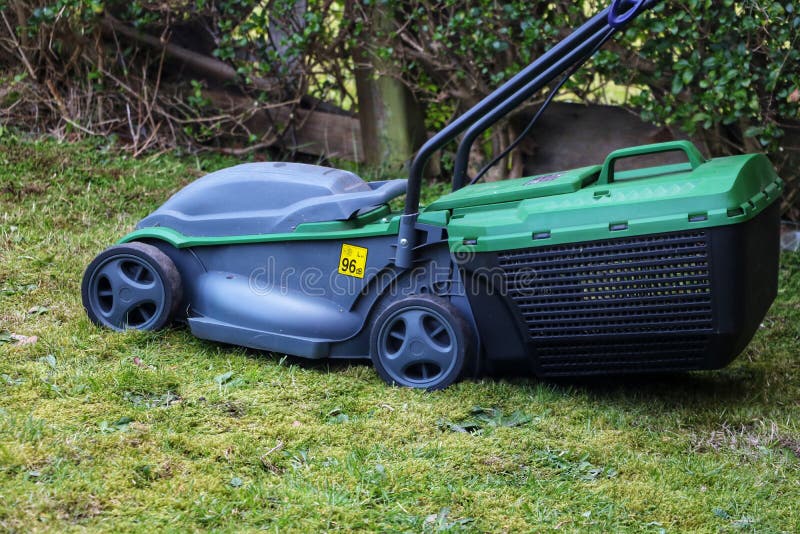 A Land Mower Machine Kept of Grass Bed in Early Spring Stock Photo ...