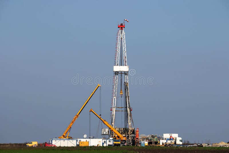 Land Oil Drilling Rig and Cranes Stock Photo - Image of high, fracking ...