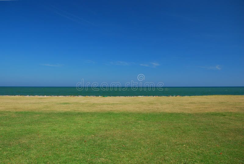 Land Sea Sky. stock image. Image of green, grass, bluesky - 55799823