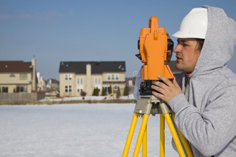 Land Surveyor in the field stock image. Image of target - 5191955