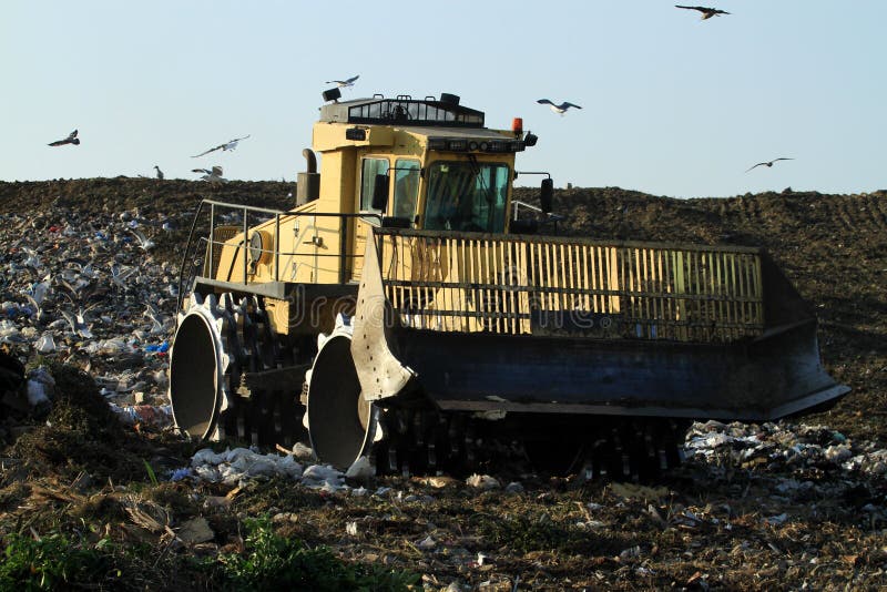 Landfill bulldozer stock image. Image of recycling, scavenging - 22978987