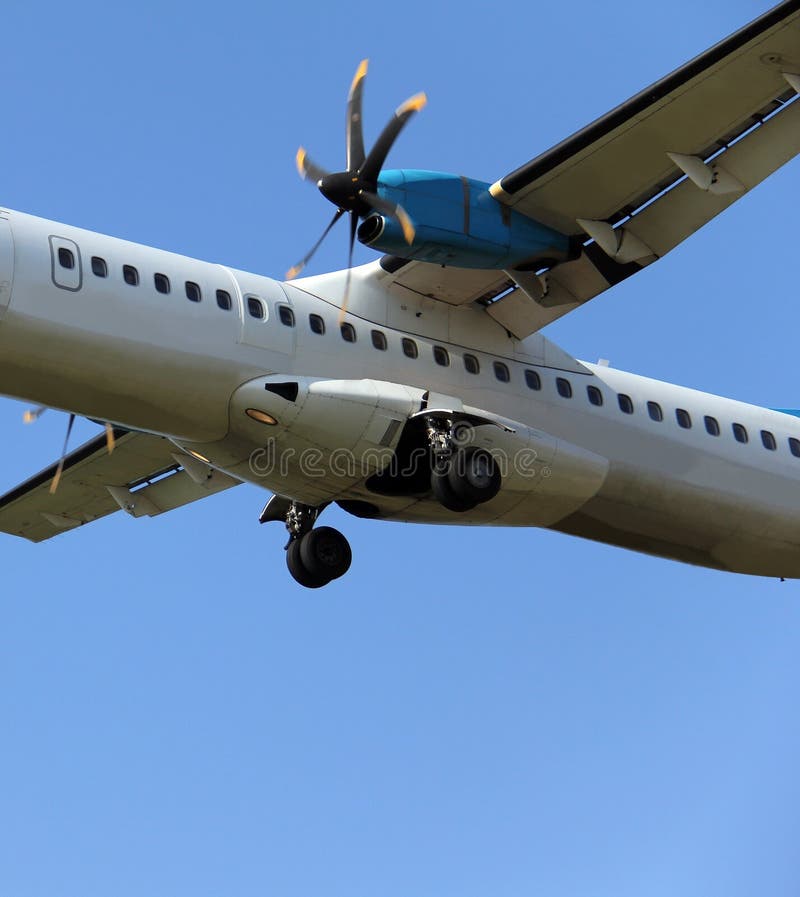 Landing aircraft stock image. Image of aircraft, blue - 28997501