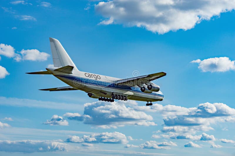Landing of the Big Cargo Airliner. Stock Image - Image of cloudscape ...
