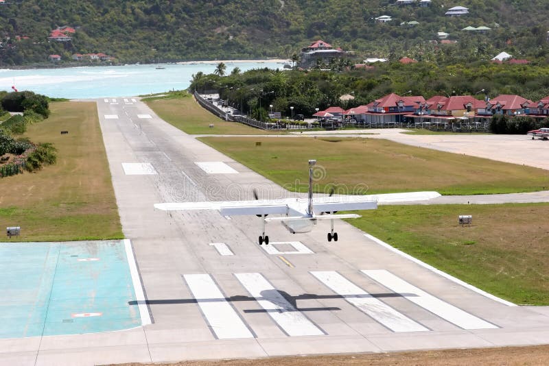 Small Plane on the Sandy Runway of Barra Airport Editorial Photography ...