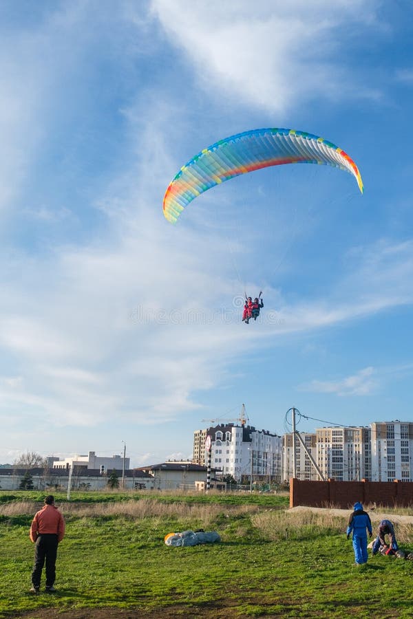Landing a Tandem Paraglider on Paradrome on a Sunny Day Editorial ...