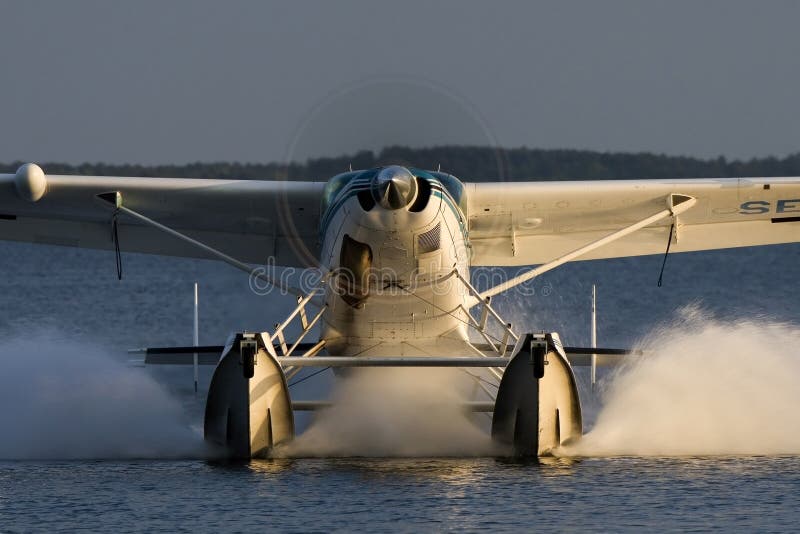 Landing on water stock photo. Image of seaplane, splash - 18909706
