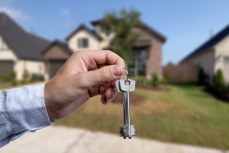 Landlord Unlocks the House Key for New Home. Stock Photo - Image of ...