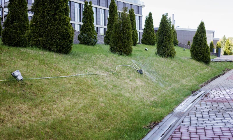 Landscape Automatic Garden Watering System Stock Image - Image of ...