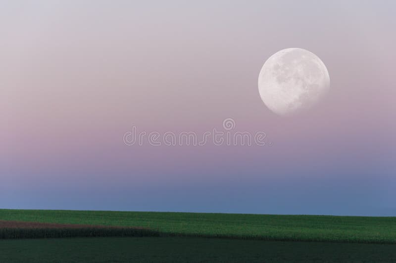 Landscape. Beautiful Big Moon Over the Green Field Stock Image - Image ...
