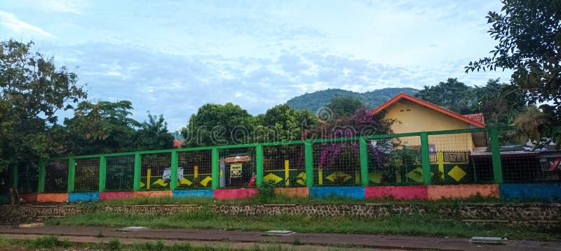 Landscape Behind Colorful School Building Stock Photo - Image of ...