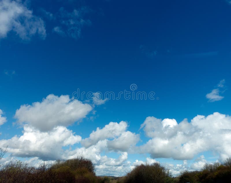Landscape with Big Heavy Fluffy Clouds on a Blue Background Stock Image ...