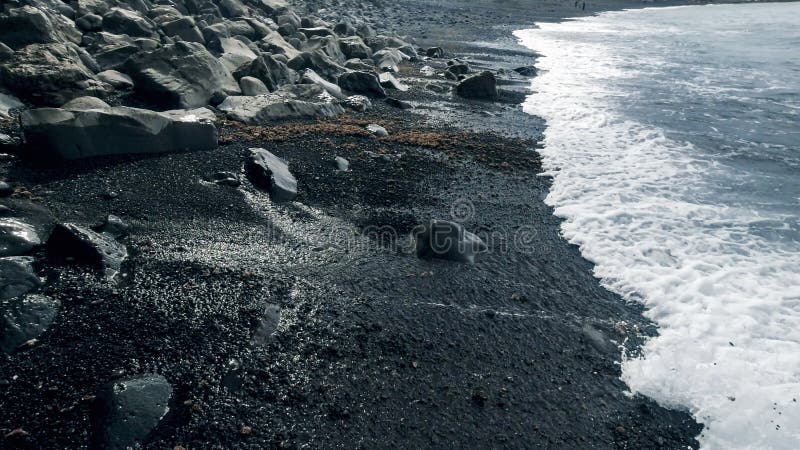 Landscape of Black Rocks and Cliffs on Volcanic Sea Beach Stock Image ...