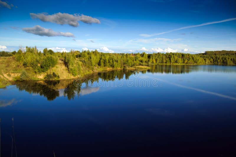 Landscape with Blue Sky and Smooth Lake Surface Stock Image - Image of ...