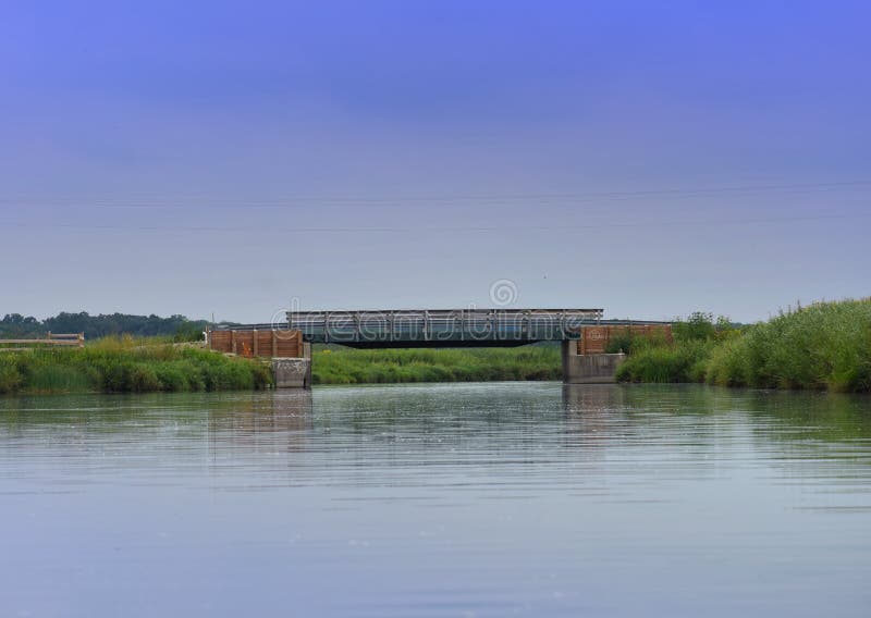 Landscape with Bridge Over Lake Stock Image - Image of reflection ...
