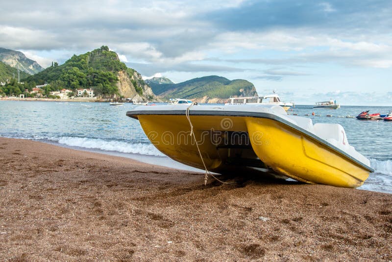 Landscape with a Catamaran on the Beach in Petrovac Editorial Stock ...