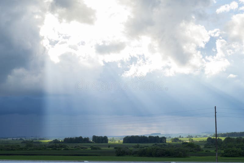 Landscape with Clouds, Rain and Sun on the Earth Stock Image - Image of ...