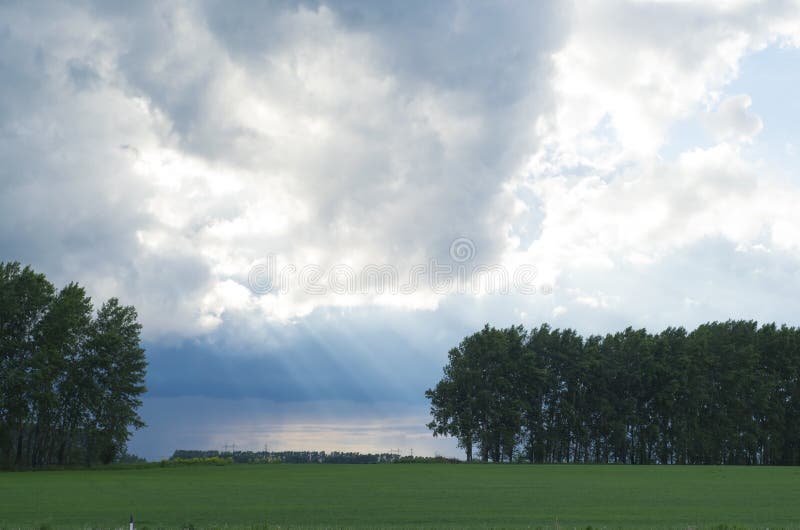 Landscape with Clouds, Rain and Sun on the Earth Stock Image - Image of ...