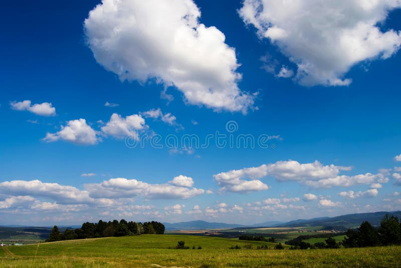 Landscape with clouds stock image. Image of grass, trees - 72303211