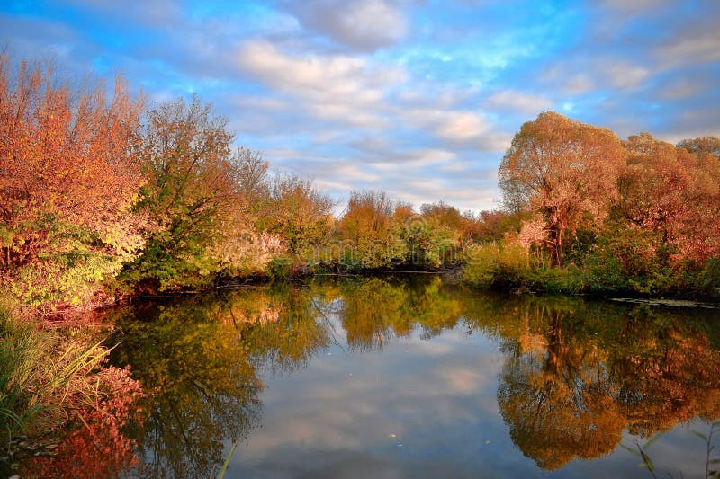 Landscape with Colorful Autumn Trees Reflected in Stock Photo - Image ... Landscape with Colorful Autumn Trees Reflected in Stock Photo - Image ...