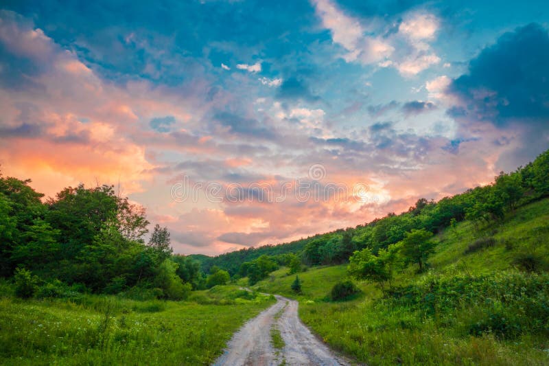 Landscape with Country Road at Sunset Stock Photo - Image of meadow ...
