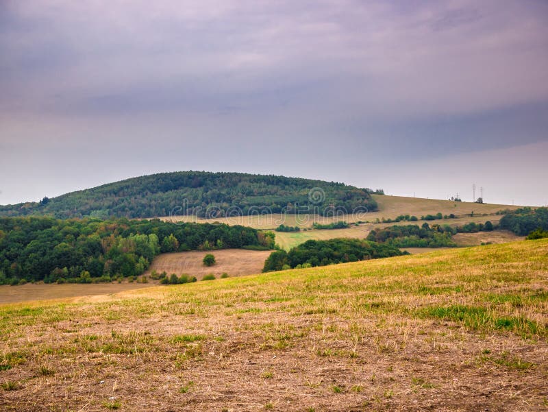 Landscape with Dry Meadows, Forest and Hill, with Cloudy Sky Stock Photo - Image of farming ...