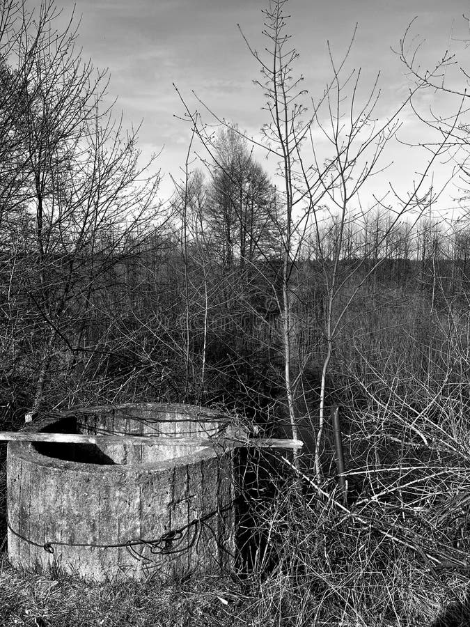Landscape in Early in Spring - an Old Abandoned Well on the River Bank ...