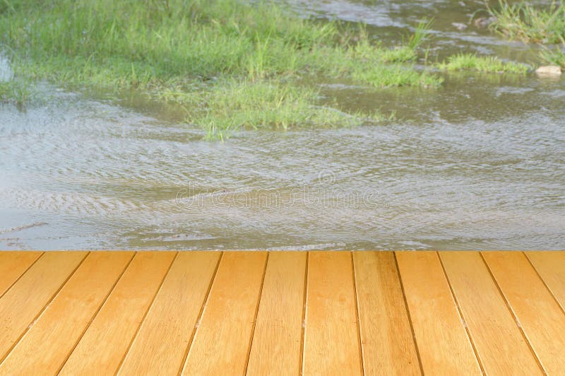 Landscape with Flooded Field and Wood Floor Stock Image - Image of ...