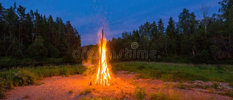 Landscape of Forest and River at Night. Huge Fire. Midsummer. Stock ...