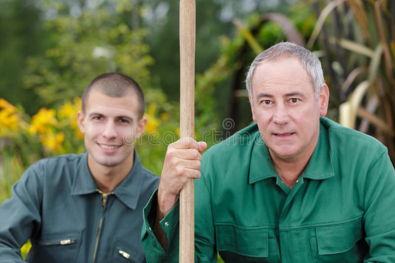 Landscape Gardeners Looking at Camera Stock Photo - Image of carrying ...
