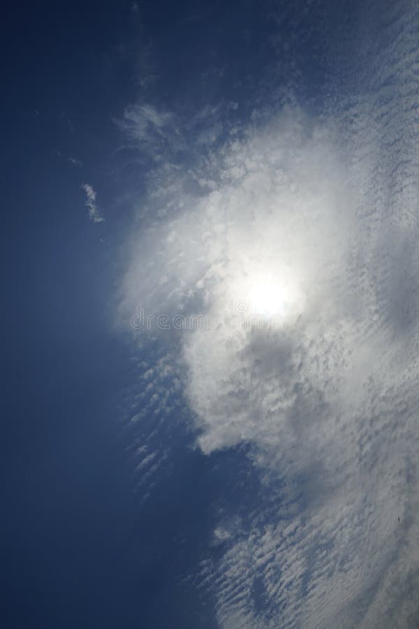 Beautiful Clouds Float Across the Sky Against the Backdrop of the Sun ...