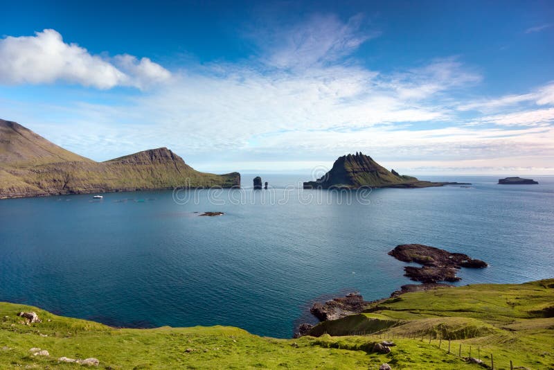 Landscape with Green Fields and Rocky Cliffs Overlooking the Sea Stock ...