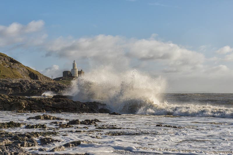 Landscape Image of Mumbles Lighthouse with Waves Stock Image - Image of ...