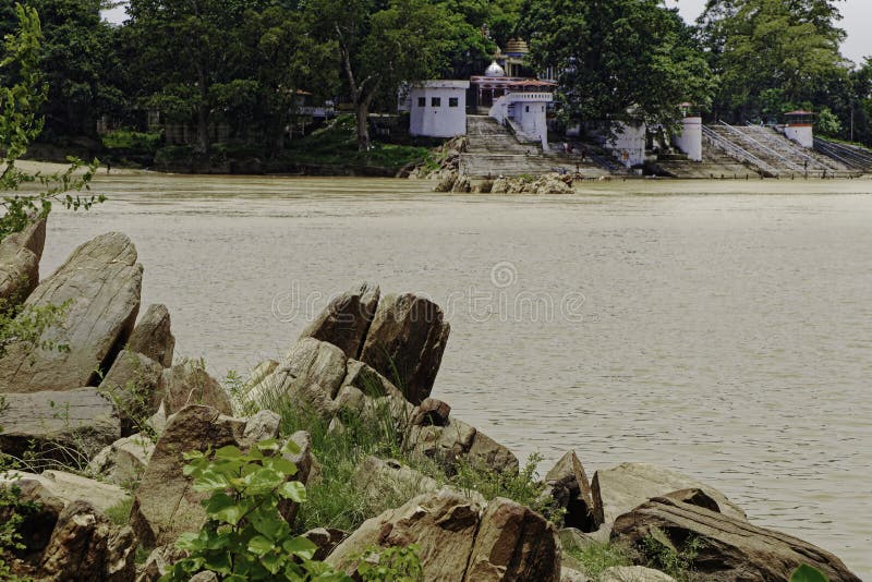 A Landscape Image of a River Flowing by an Ancient Temple Stock Image ...