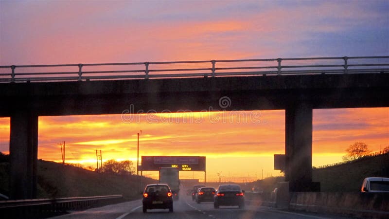 View of the Sunset from the Motorway Stock Image - Image of silhouette ...