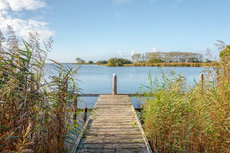 Landscape with a Lake and a Jetty. Stock Photo - Image of panorama ...