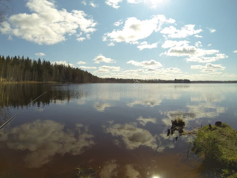 Landscape with a Lake and Beautiful Cloud Reflections Stock Image ...