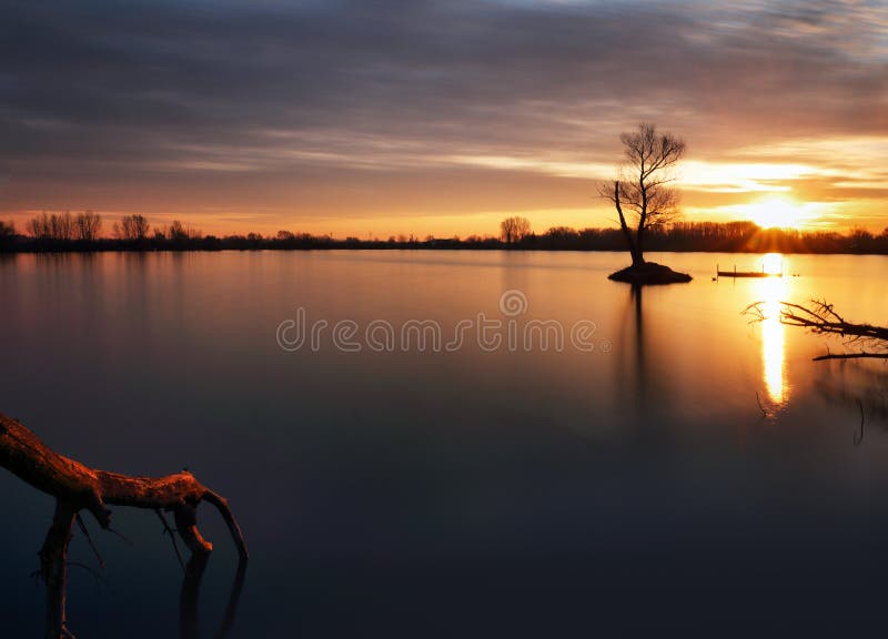 Sunrise Reflection on Morning Mist Lake Stock Image - Image of tree ...