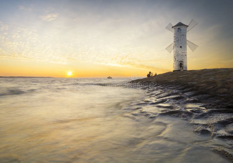 Landscape Marine Lighthouse in the Shape of a Windmill Stock Image ...