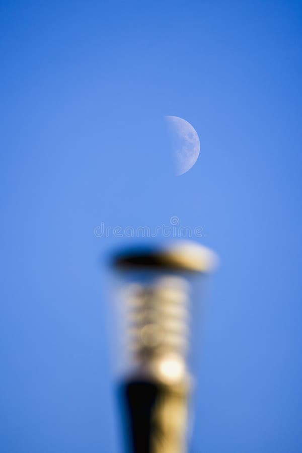 Landscape with the Moon in Focus and a Blurred Street Light. Stock ...