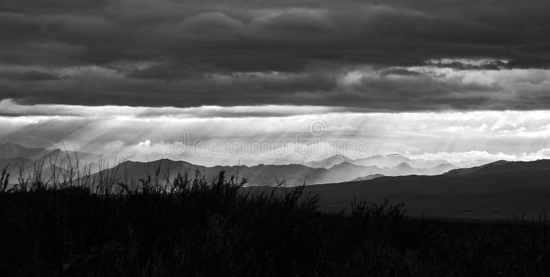 Landscape with a Mountain Range and the Rays of the Sun Breaking ...