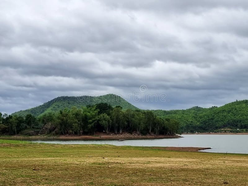 The Landscape of the Mountain and the Reservoir on Nimbus Clouds in the ...