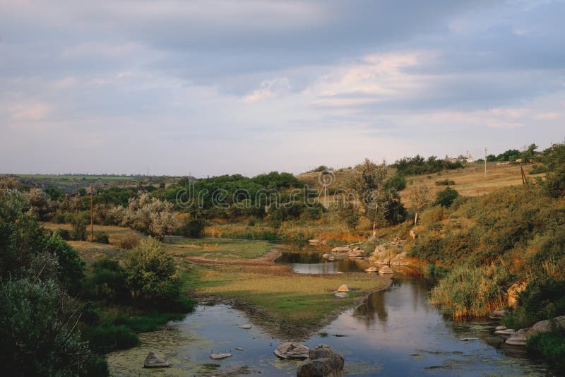 Landscape with Mountains, Forest and a River in Front. Stock Photo ...