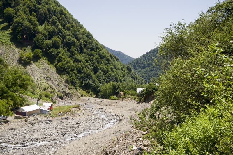 Landscape with Mountains, Forest and a River in Front. Stock Photo ...