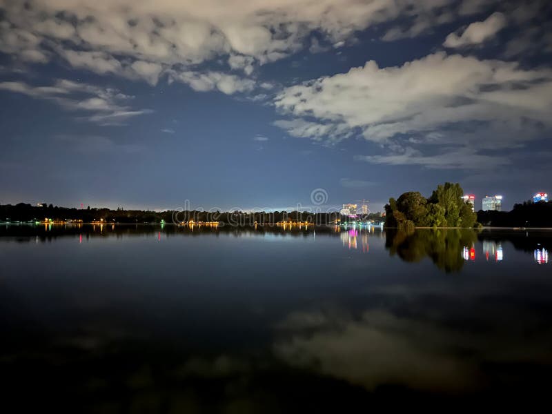 Landscape of Night View with City Lights and Clouds Reflecting on the ...