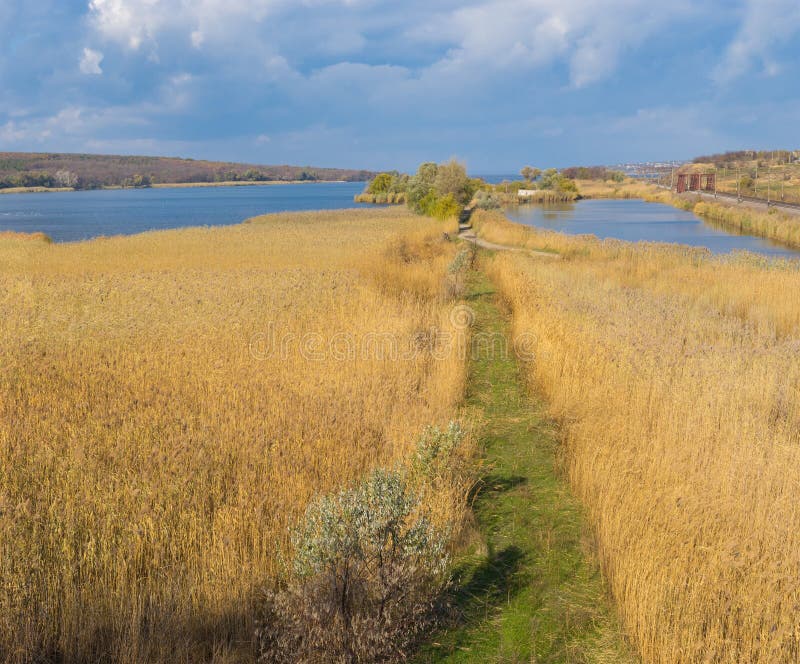 Landscape with Path in Rush Field Near Dnepr River, Ukraine Stock Photo ...